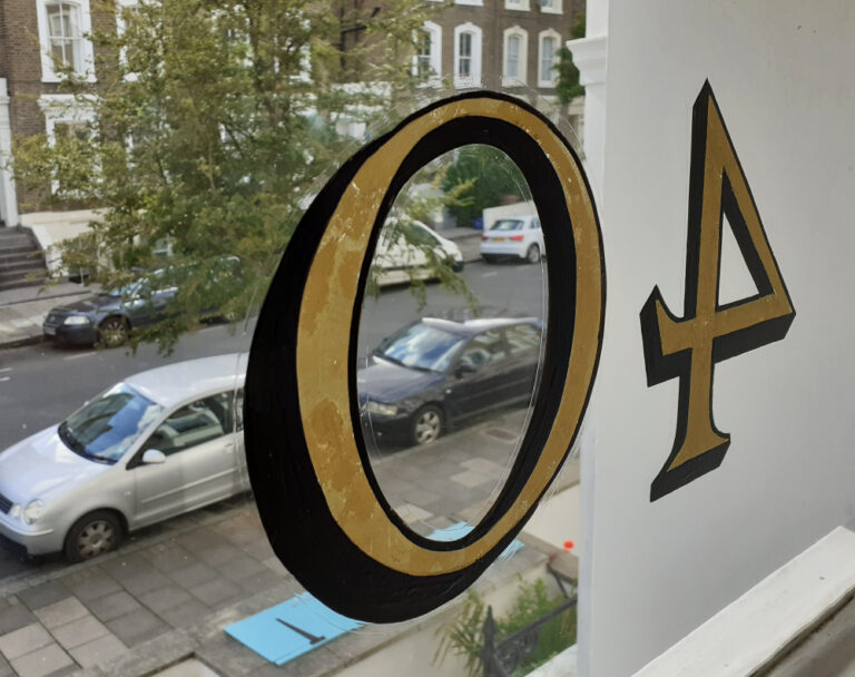 Street numbers on fanlight glass - Traditional Signs of London